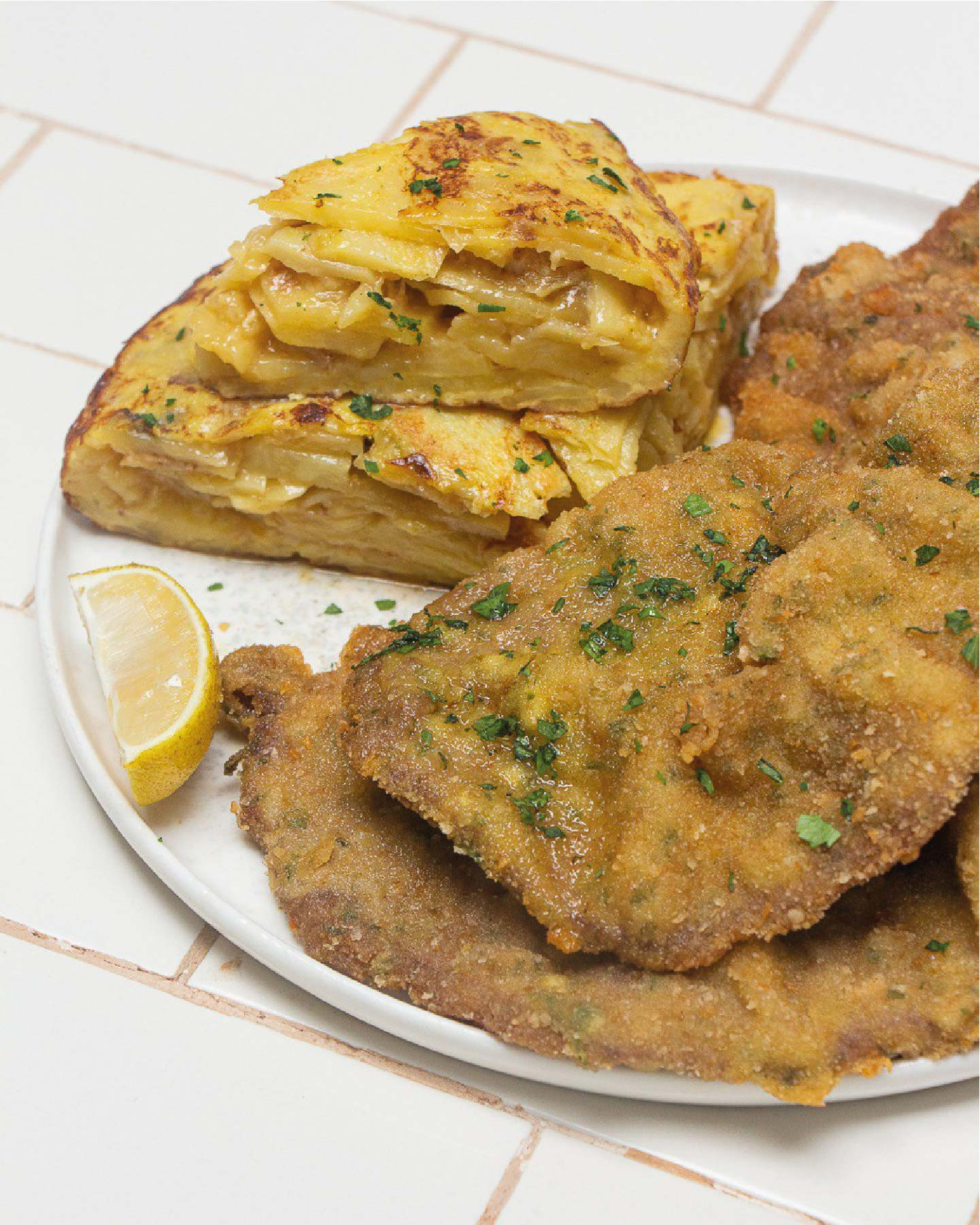 MILANESA CON TORTILLA - Cocineros Argentinos